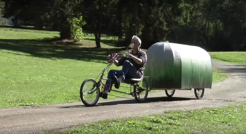 Man builds so tiny home he can pull it with bike. Take a look inside to ...